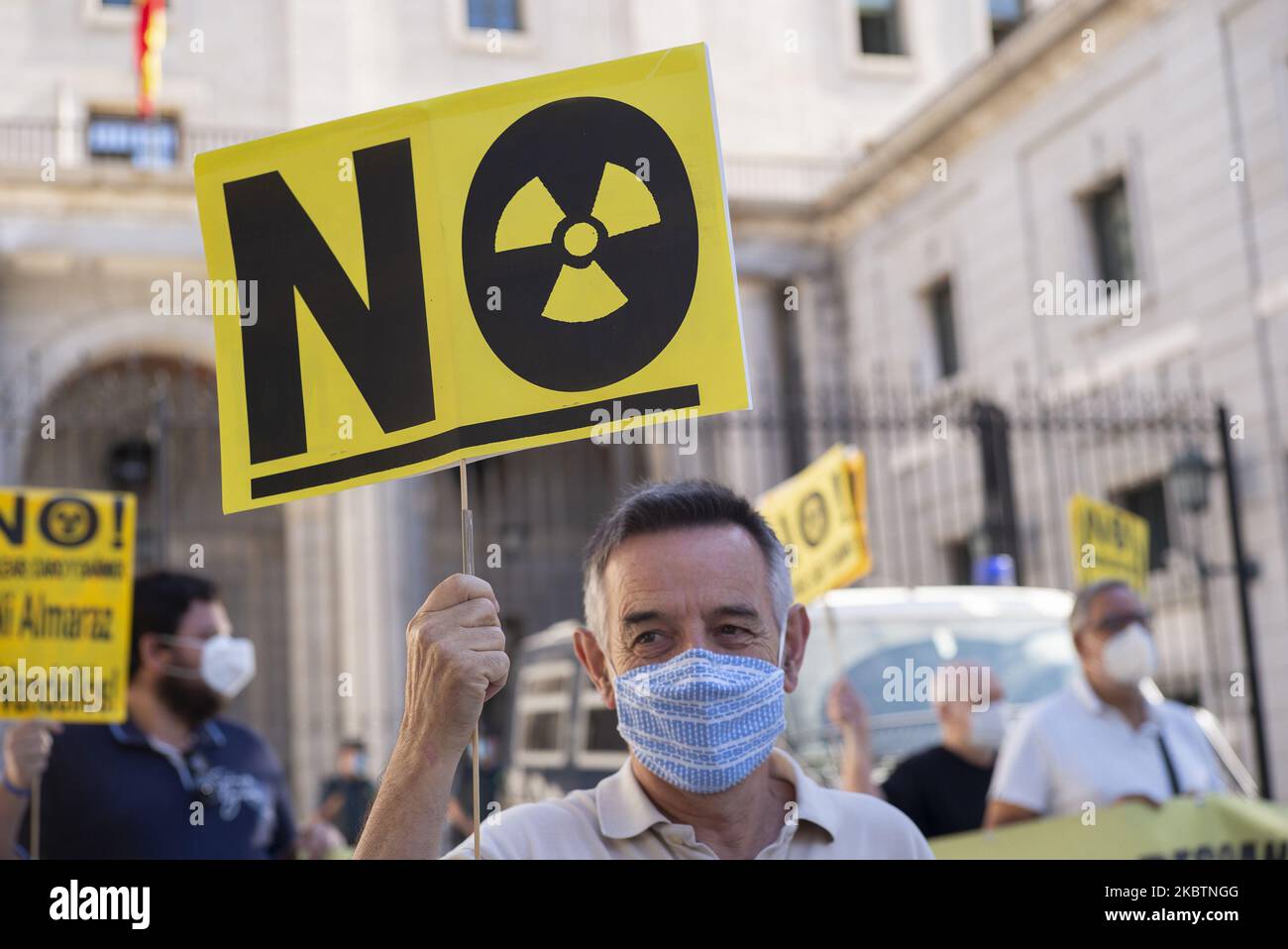 A group of people from the Iberian anti-nuclear movement gather in ...