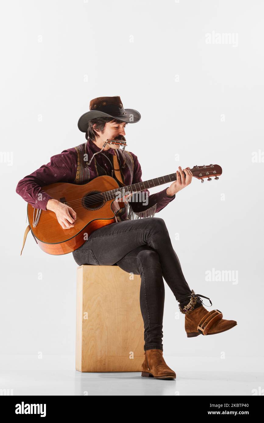 Portrait man playing harmonica hi-res stock photography and images - Alamy
