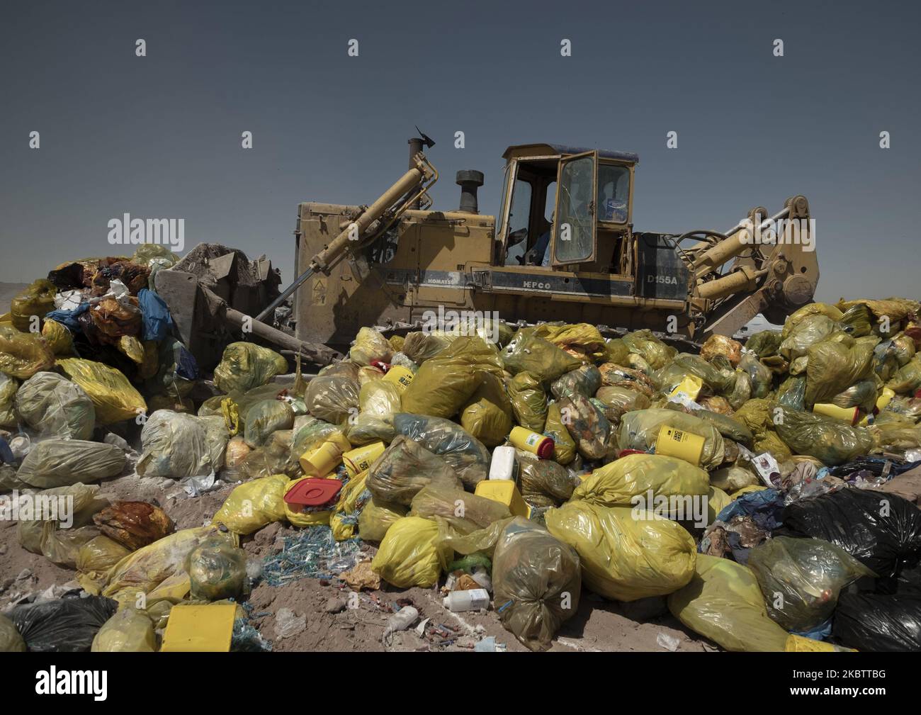 A vehicle works on infectious wastes in Tehran Garbage Disposal Center ...