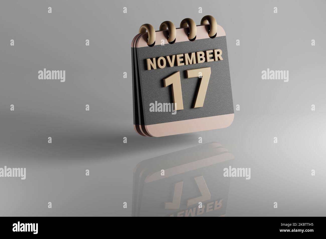 Standing black and golden month lined desk calendar with date November ...