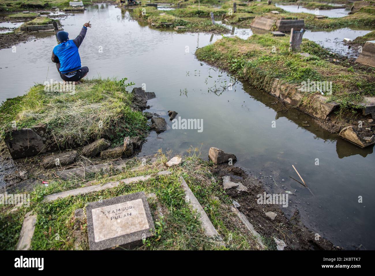 A view of public cemetery which submerged by flood waters from rising ...