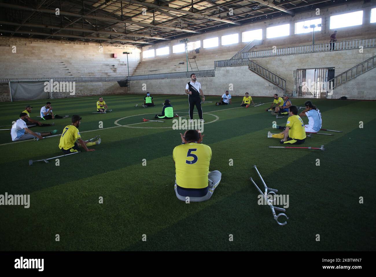 Amputated Syrian youth take part in a soccer training session at a ...