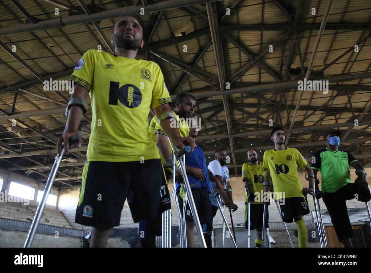 Amputated Syrian youth take part in a soccer training session at a ...