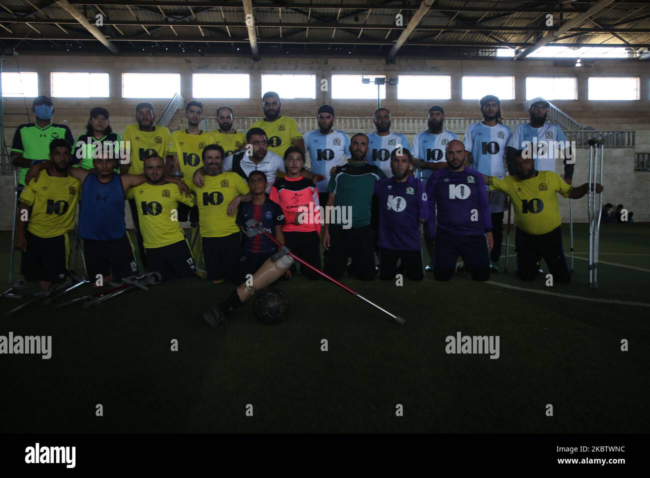 Amputated Syrian youth take part in a soccer training session at a ...