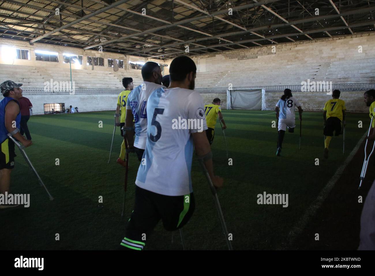 Amputated Syrian youth take part in a soccer training session at a ...