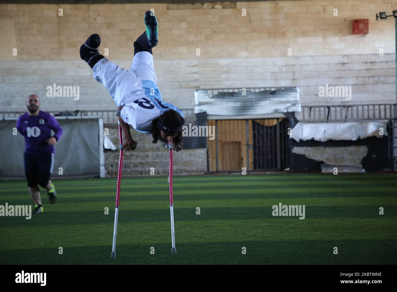 Amputated Syrian youth take part in a soccer training session at a ...