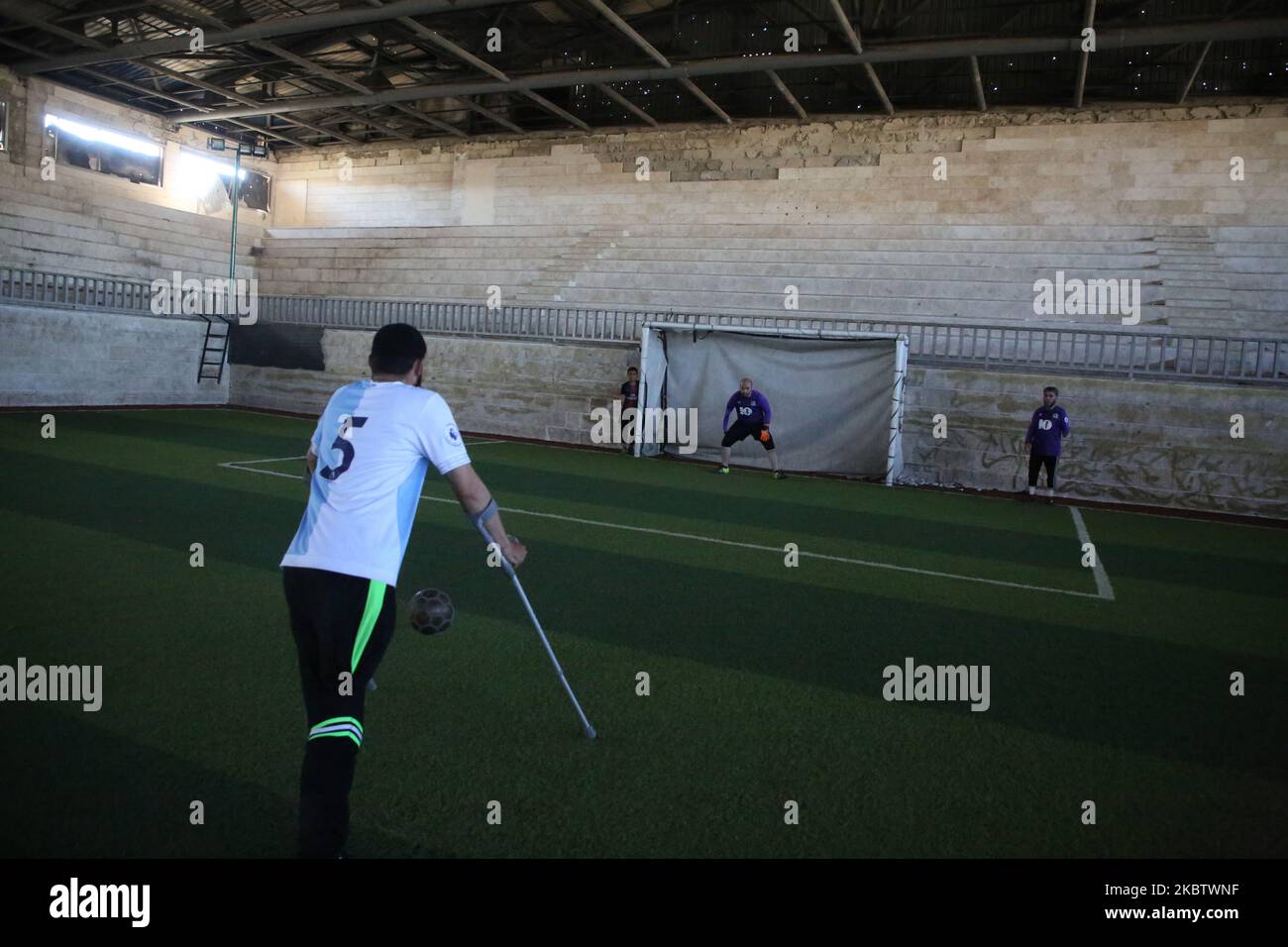 Amputated Syrian youth take part in a soccer training session at a ...