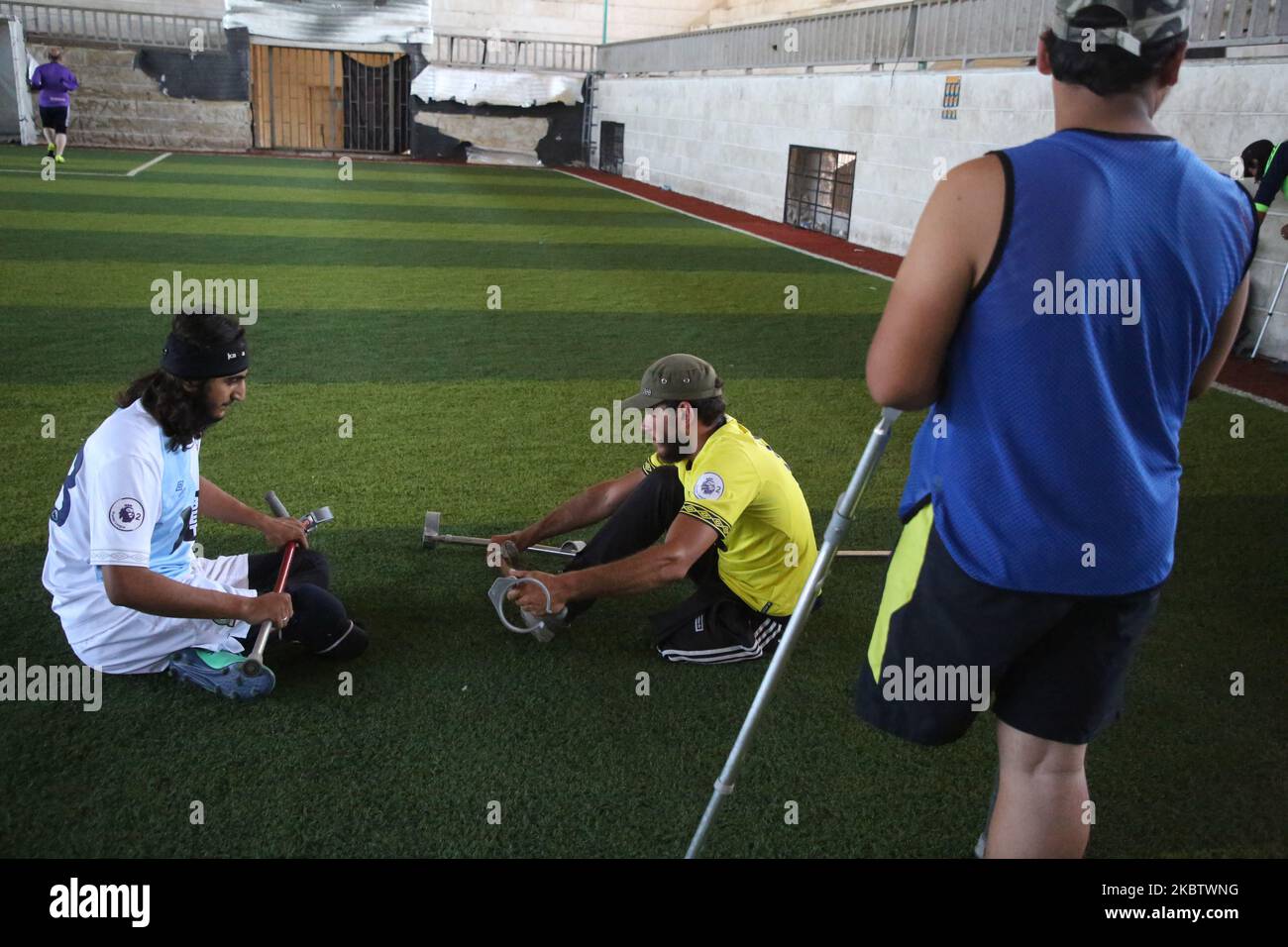Amputated Syrian youth take part in a soccer training session at a ...
