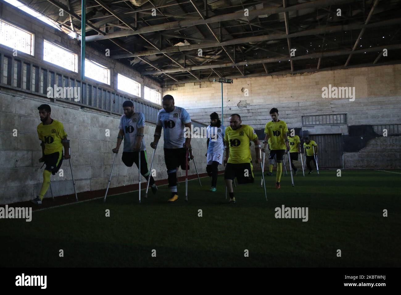 Amputated Syrian youth take part in a soccer training session at a ...