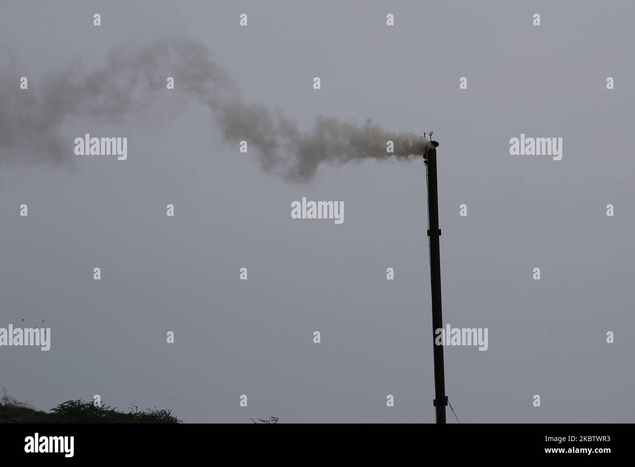 Smoke emitting from a crematorium site where Covid-19 dead bodies are ...