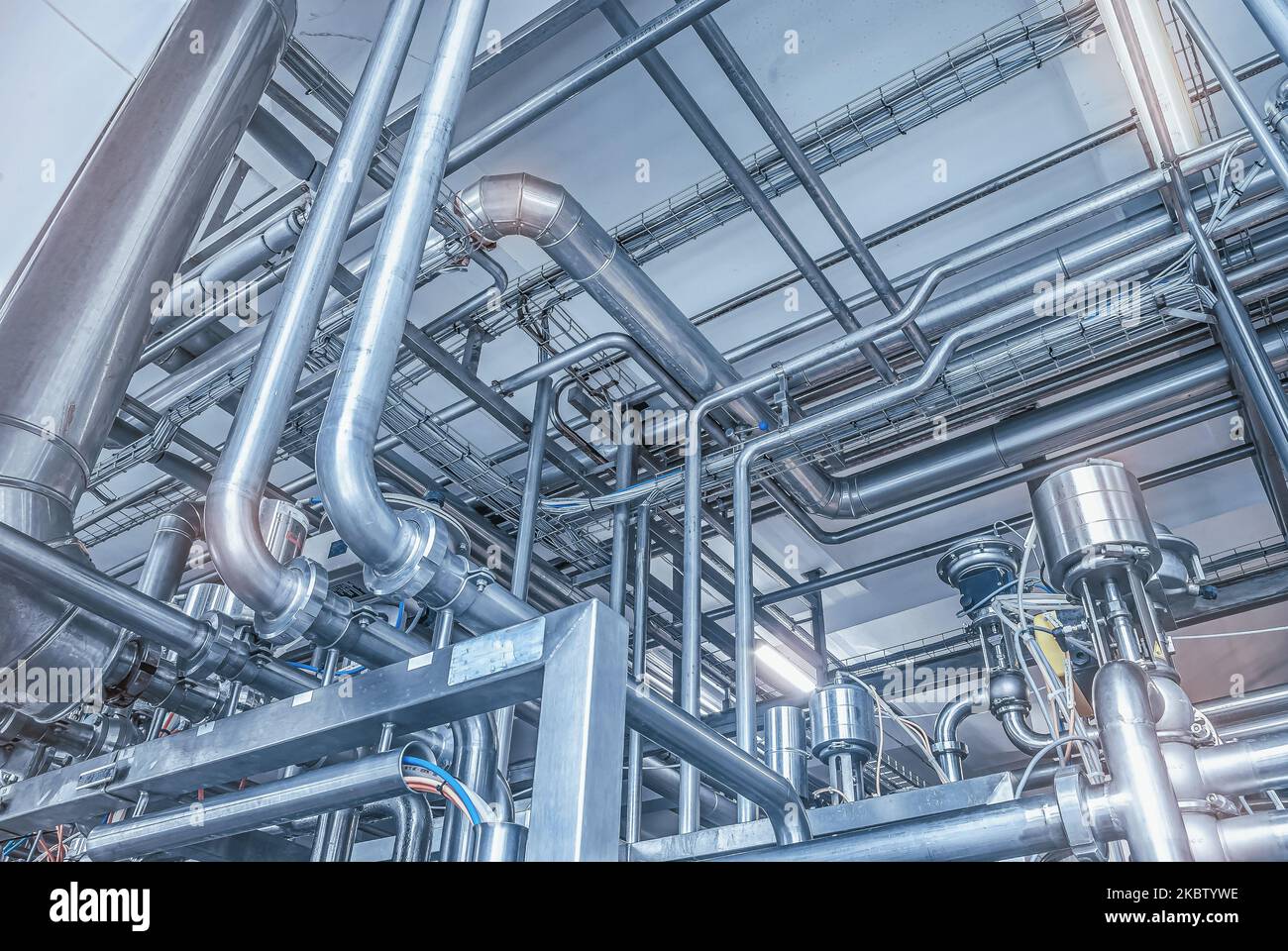 Stainless steel pipes in the factory. Construction on food production ...