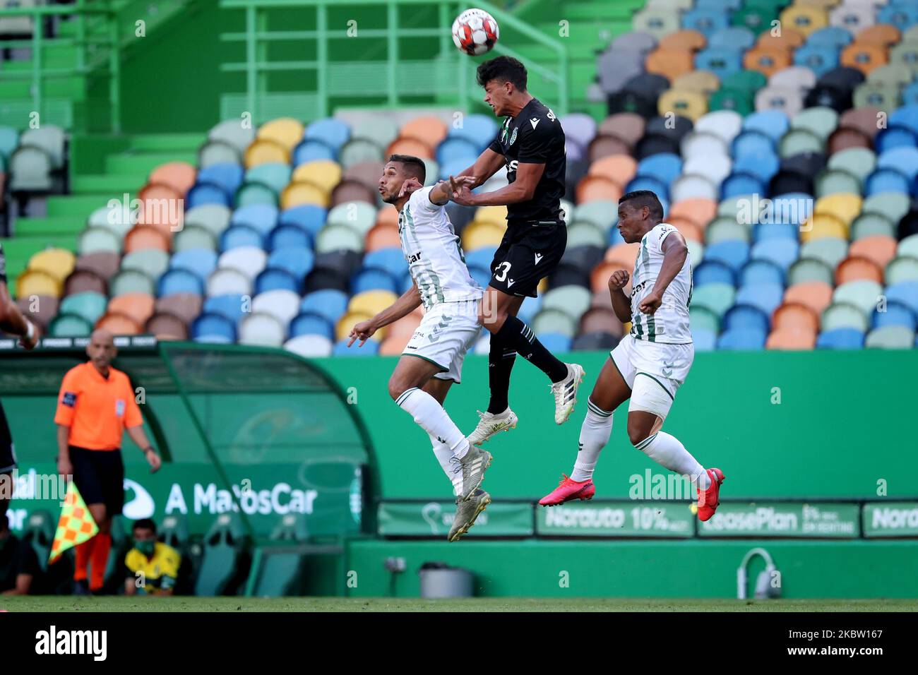 Matheus of Sporting CP (C ) vies with Leandrinho (L) and Eber Bessa of ...