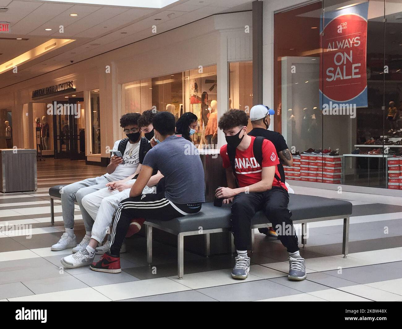 Teenagers wearing face masks to protect from the novel coronavirus ...