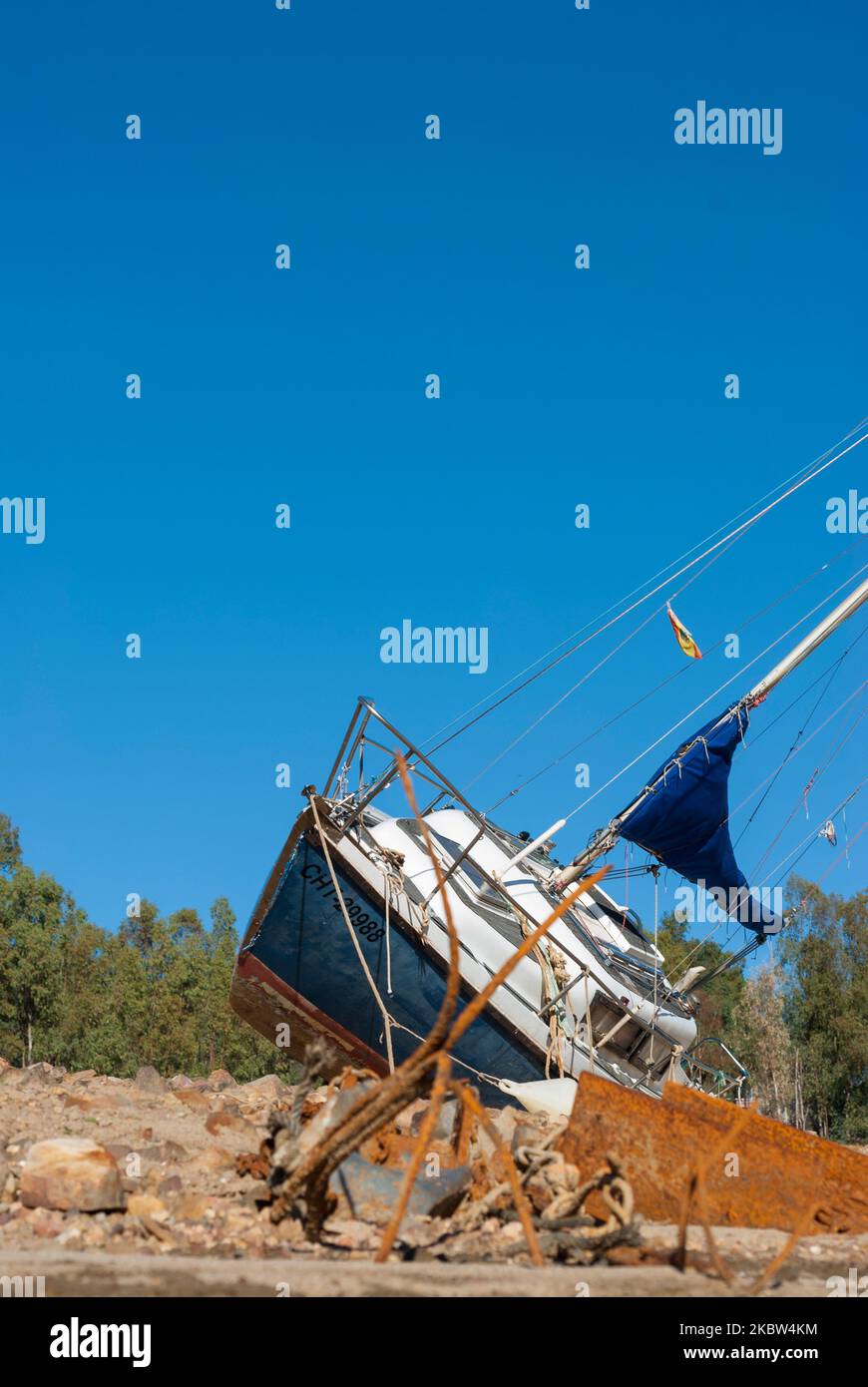 sailboat stranded on land due to drought with blue sky Stock Photo - Alamy