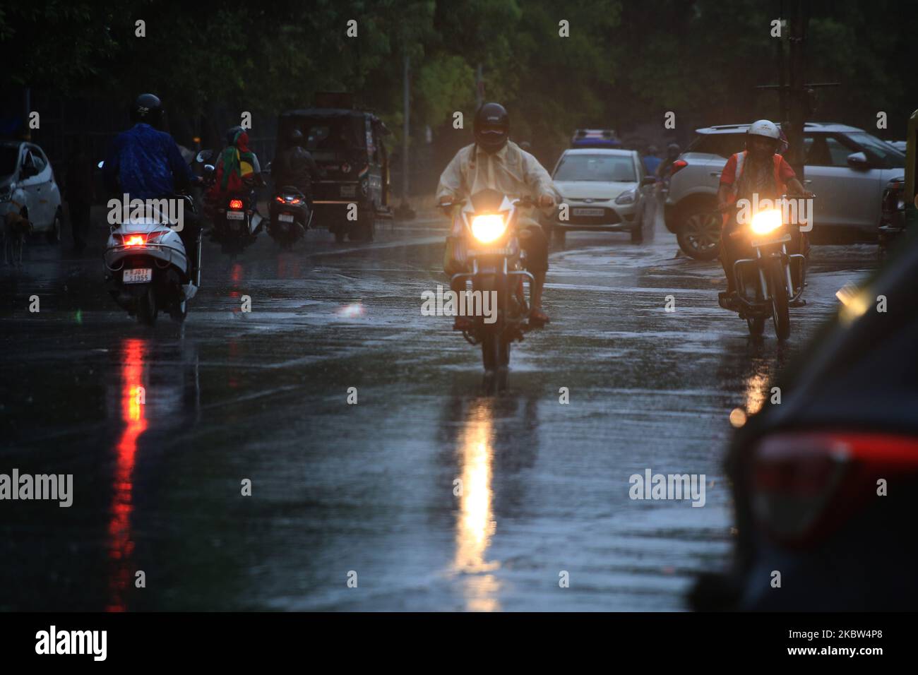Indian People during the heavy monsoon rain shower in Ajmer, Rajasthan ...