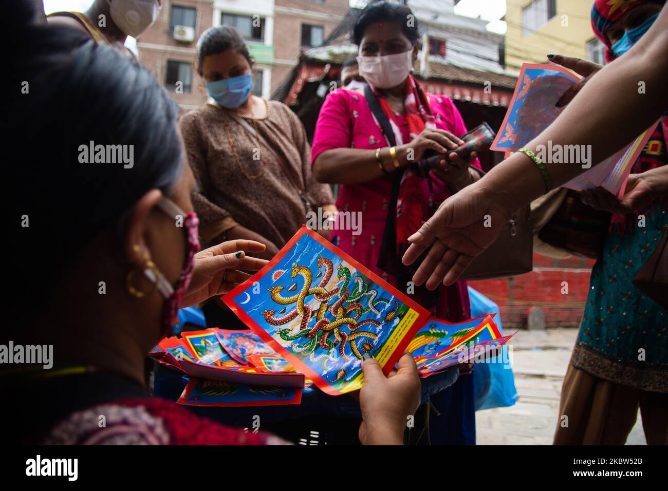 Nepalese people buys Nag Poster for the celebration of Nag Panchami at ...