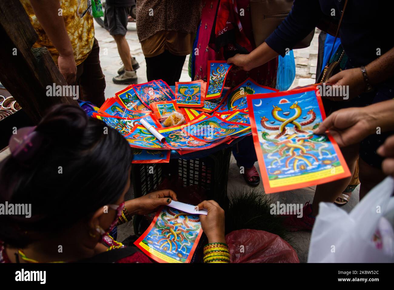 Nepalese people buys Nag Poster for the celebration of Nag Panchami at ...