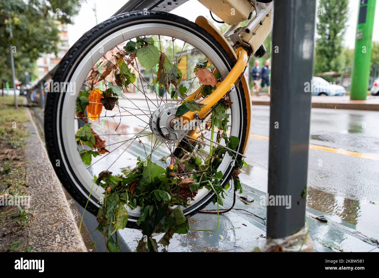 A damaged bike during storm and flooding of the Seveso river on July 24 ...