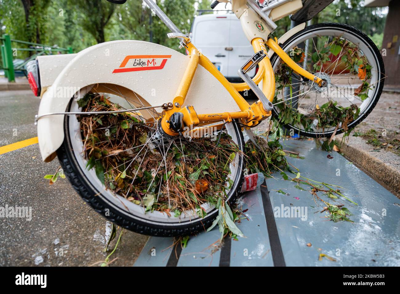 A damaged bike during storm and flooding of the Seveso river on July 24 ...