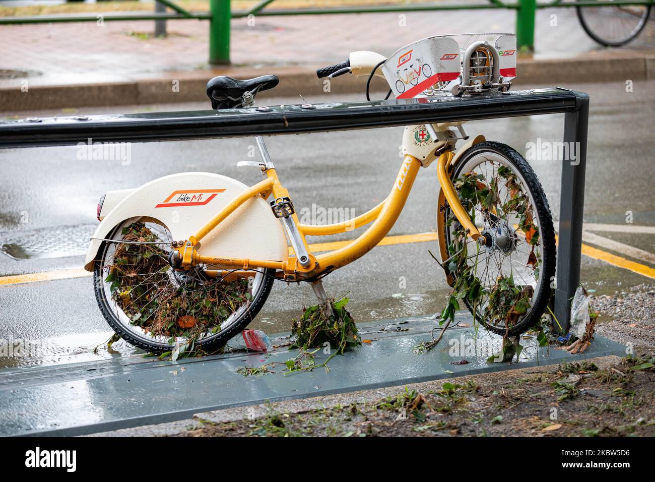 A damaged bike during storm and flooding of the Seveso river on July 24 ...
