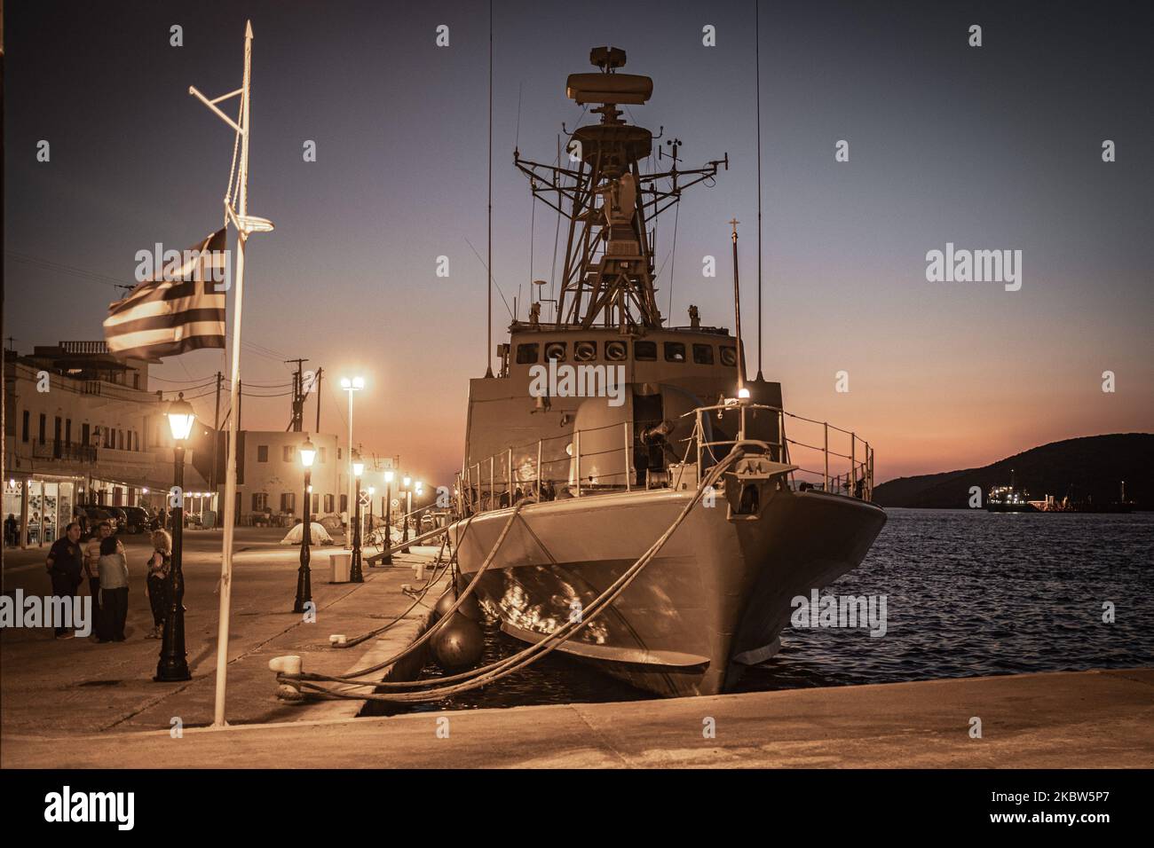 A Greek military ship stationed in the port of Katapola on the Greek ...