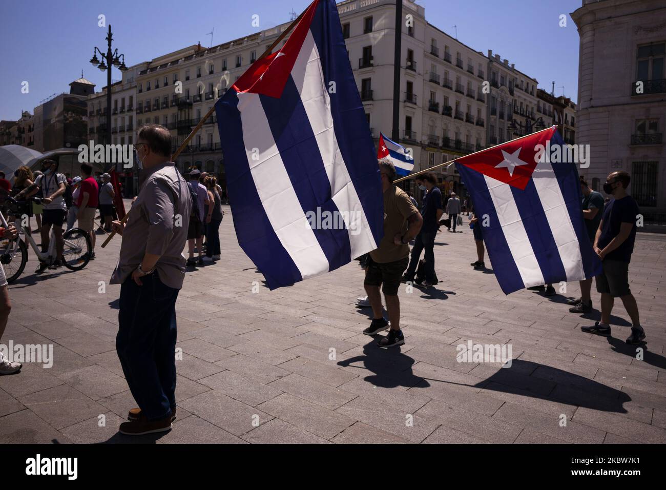 Protesters with Cuban flags during the demonstration with the slogan ...