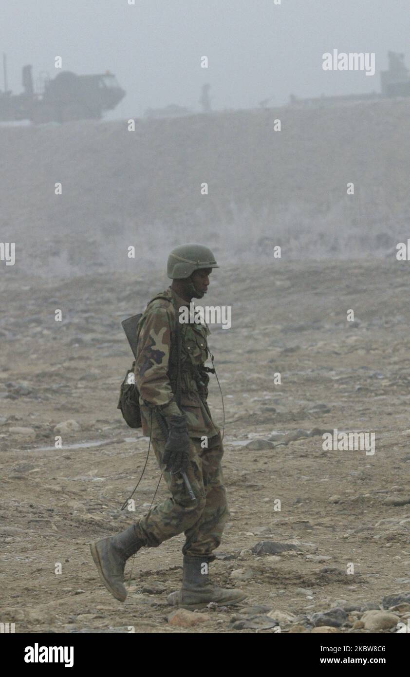 US Military patrol their around their position during an joint drill ...