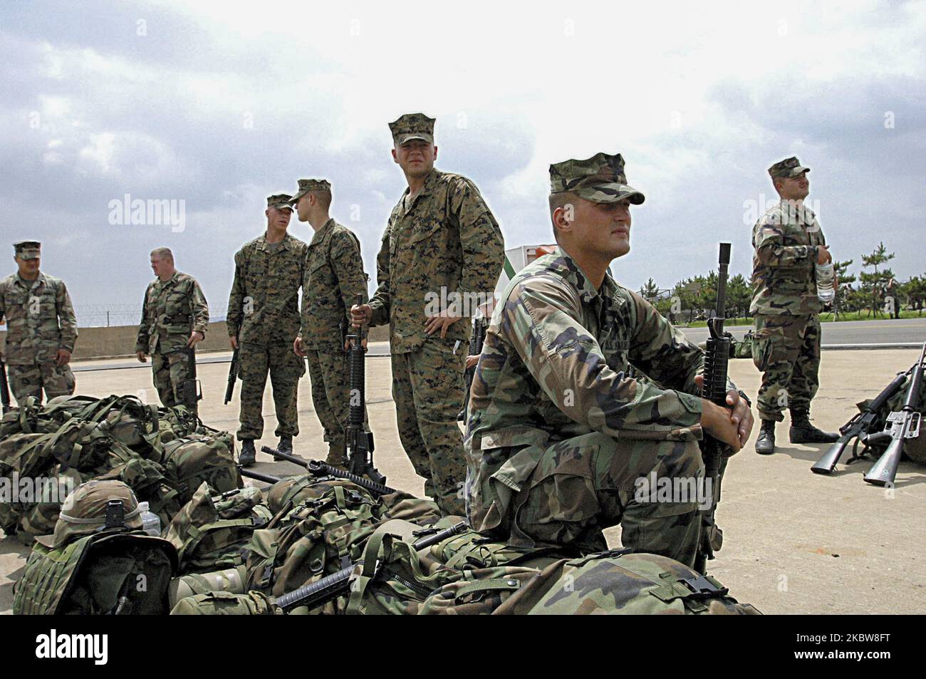 June 24, 2003-Pohang, South Korea-US Marines wait for their Air-cushion ...