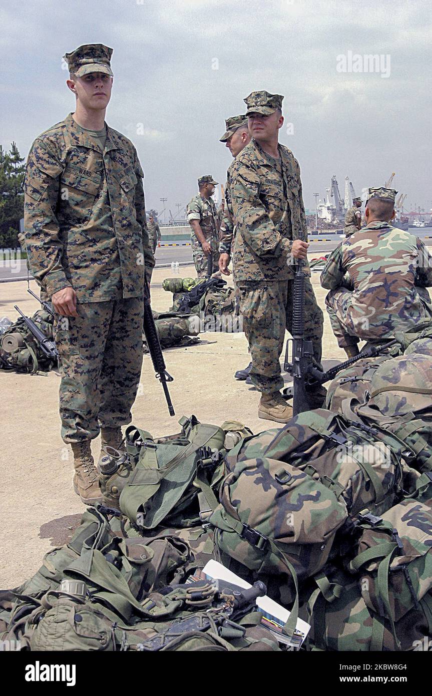 June 24, 2003-Pohang, South Korea-US Marines wait for their Air-cushion ...