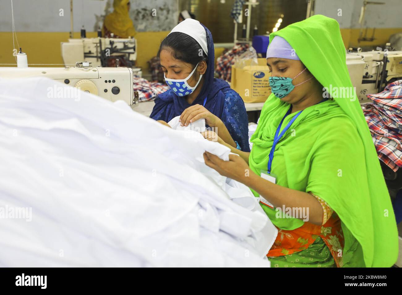 Ready made garments workers works in a garments factory in Dhaka on ...