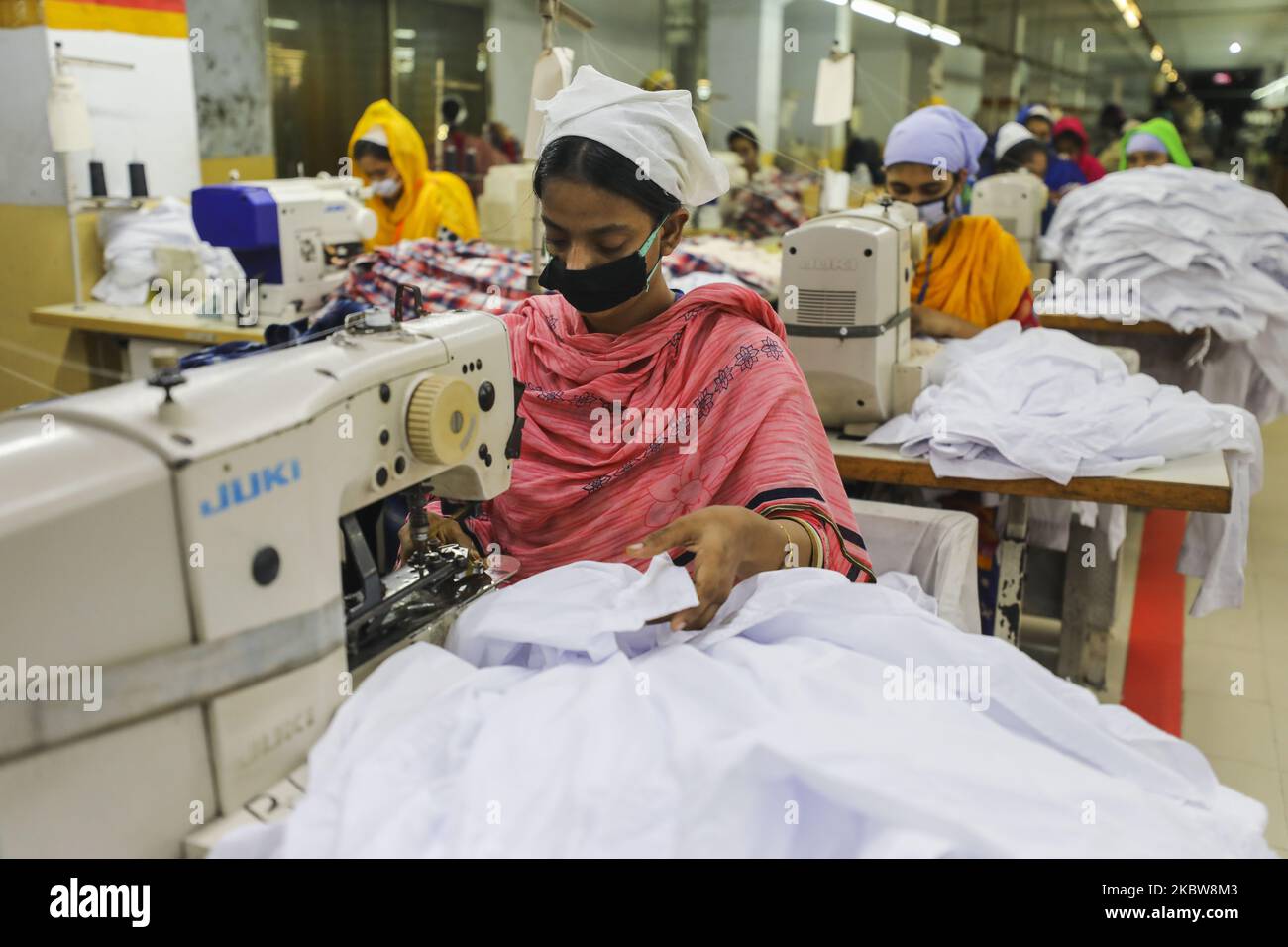 Ready made garments workers works in a garments factory in Dhaka on ...