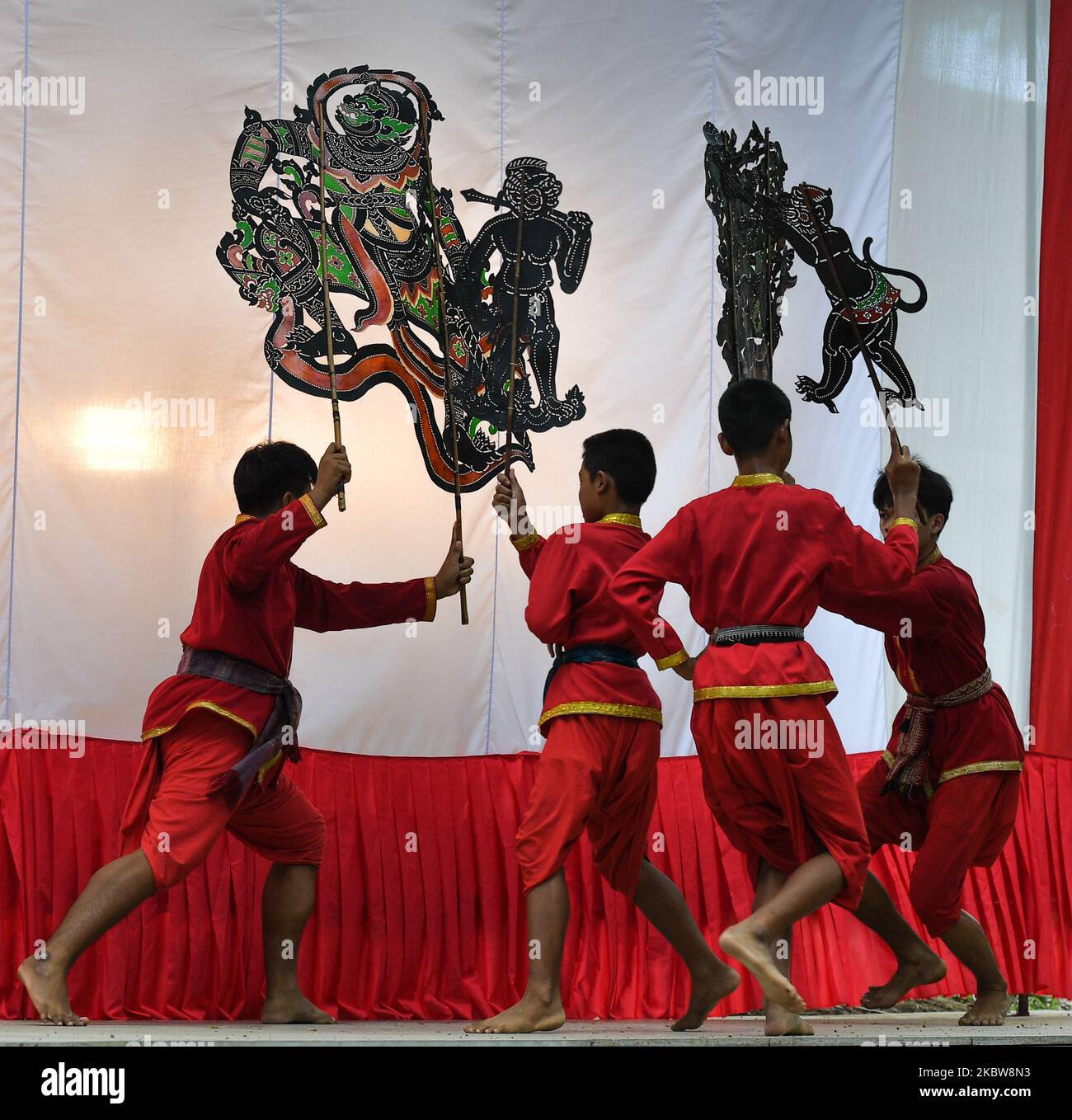 Actors’s movements with Nang Yai shadow puppets while performing the ...