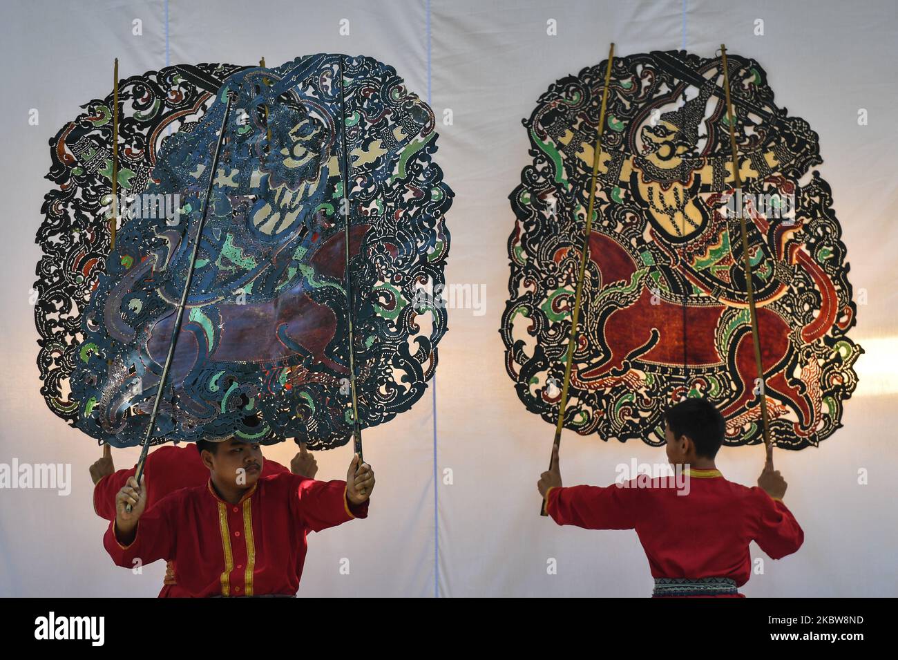 Actors’s movements with Nang Yai shadow puppets while performing the ...