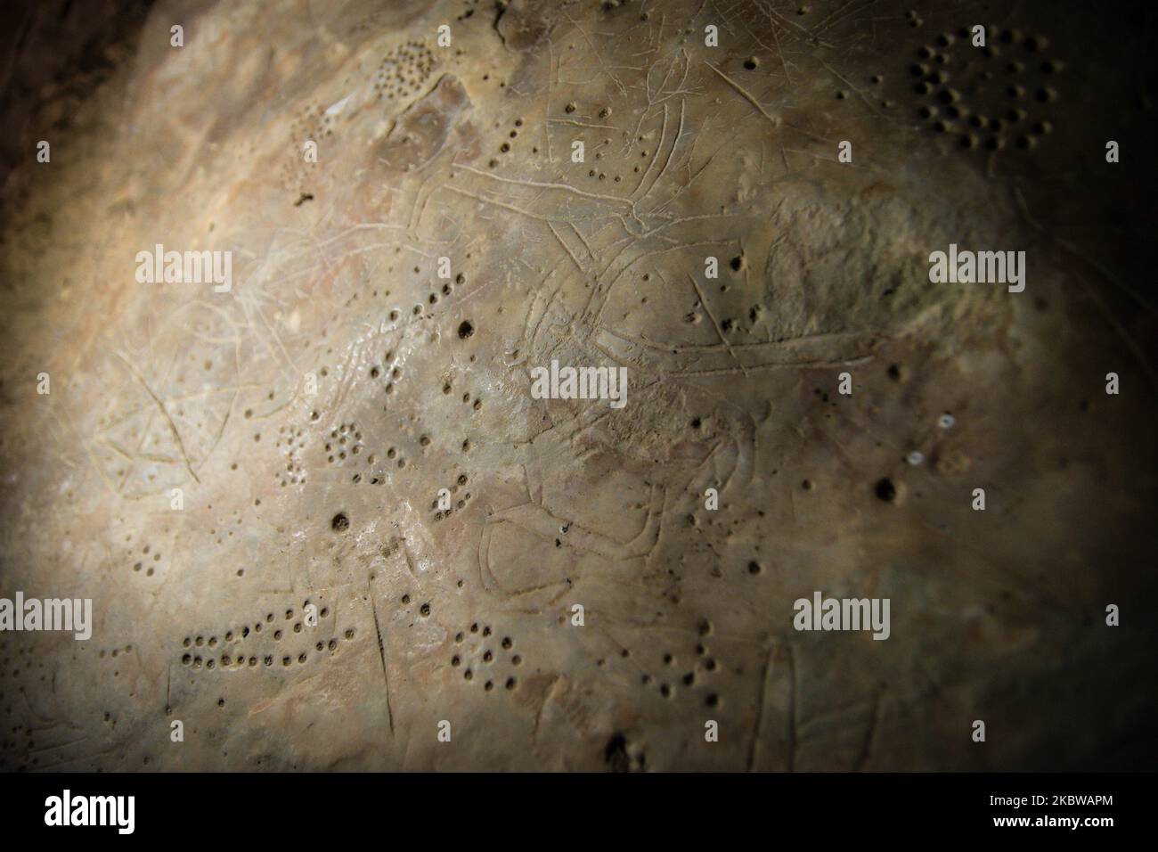 Engraved paleolithic rock carvings hi-res stock photography and images ...