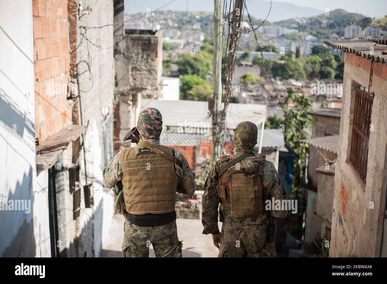 Police officers from the Special Operations Battalion (BOPE) are seen ...