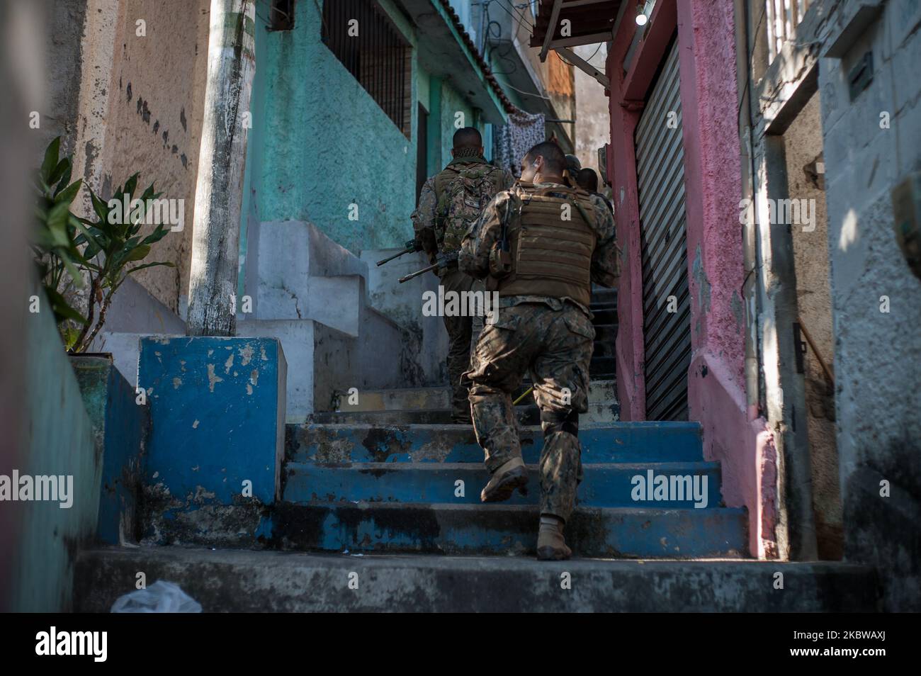 Police officers from the Special Operations Battalion (BOPE) are seen ...