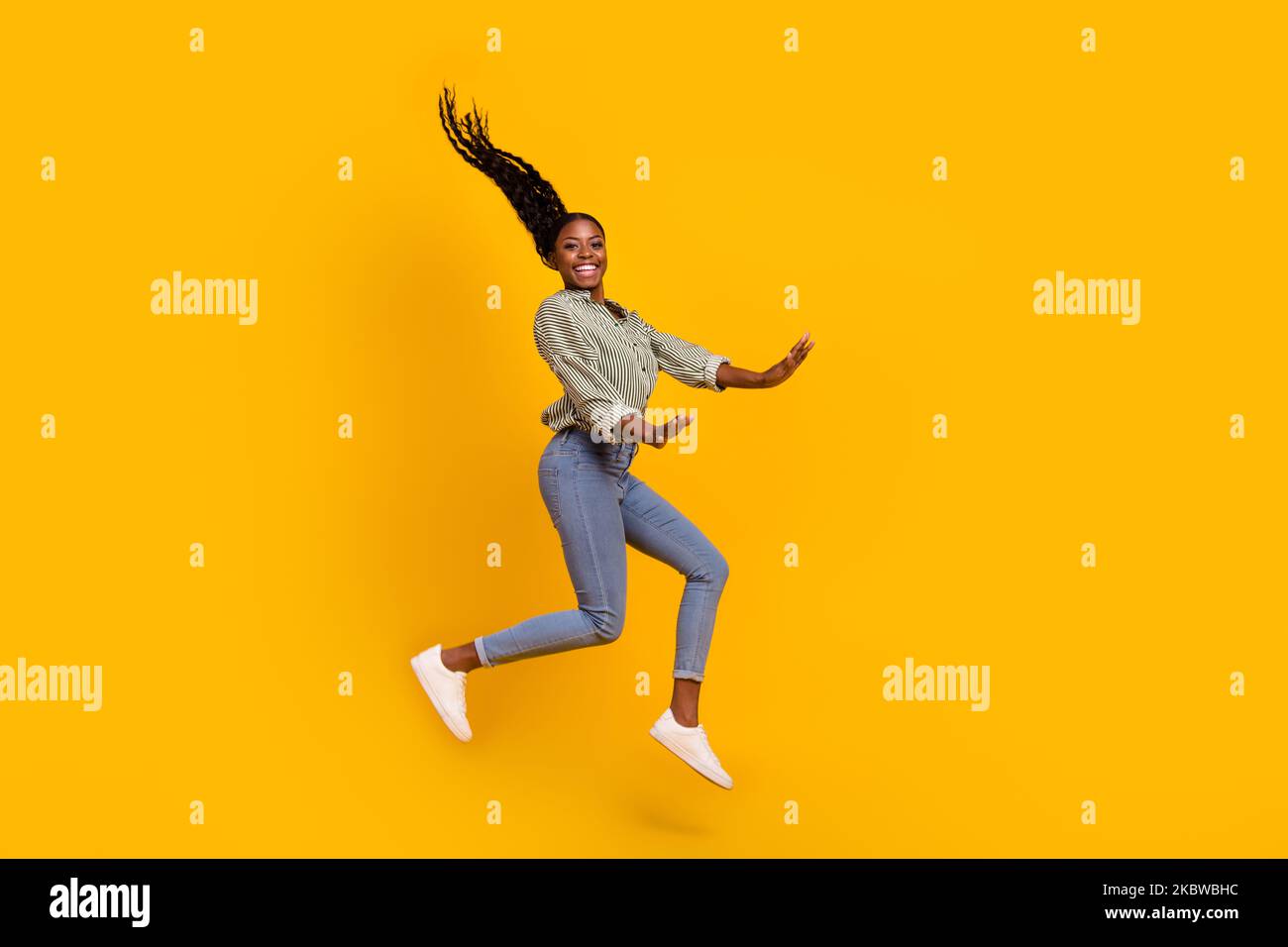 Full length portrait of pretty cheerful girl jump have fun rejoice ...