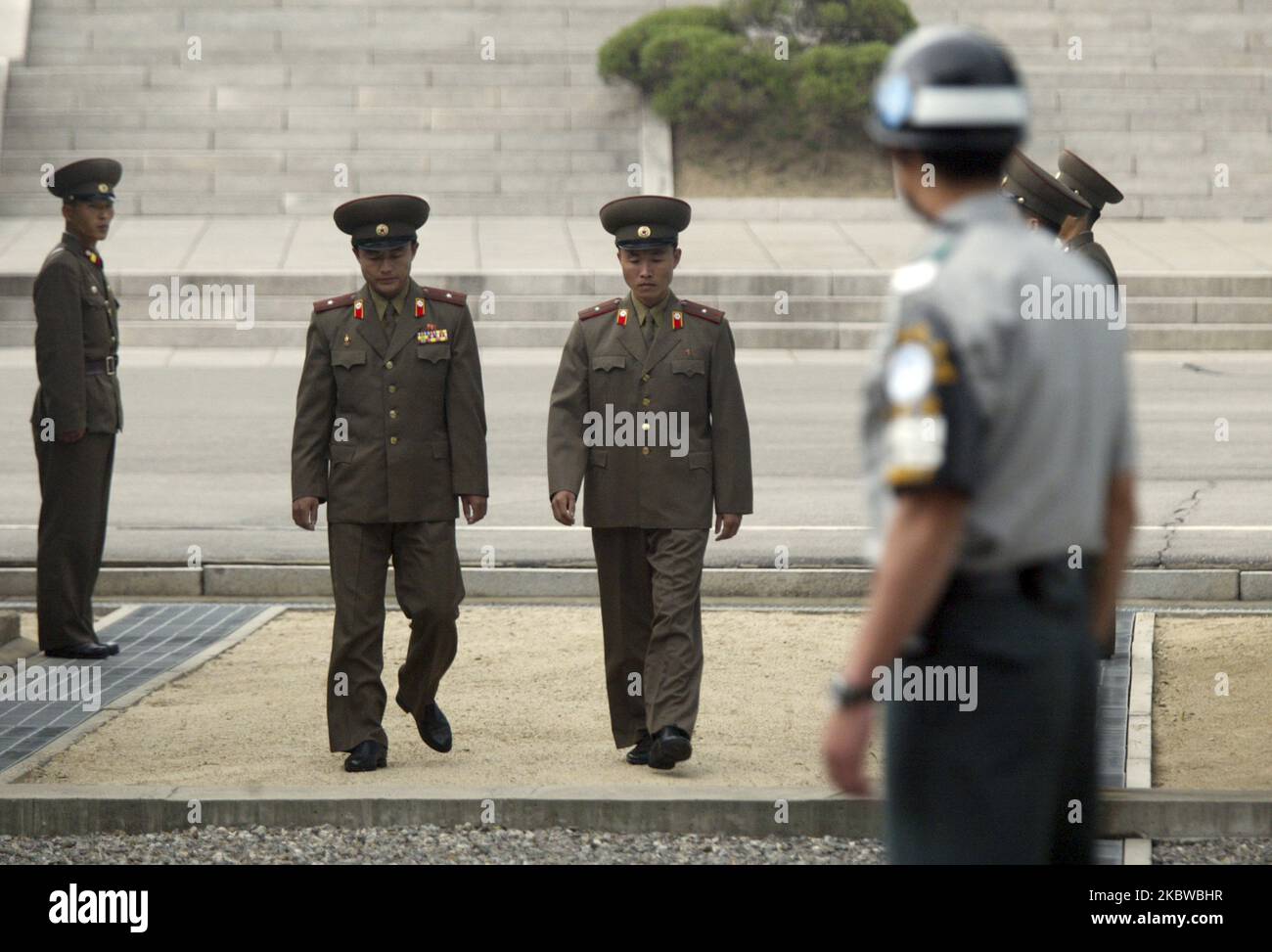 Oct 16, 2006-Paju, South Korea-Noth Korean and South Korea soldiers ...