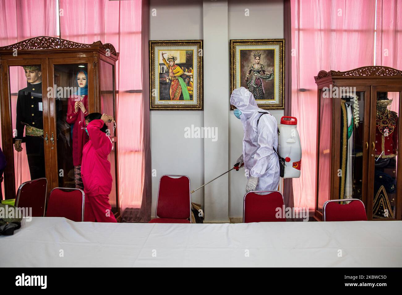 Medical team doing desinfectan of the place after the swab test process ...