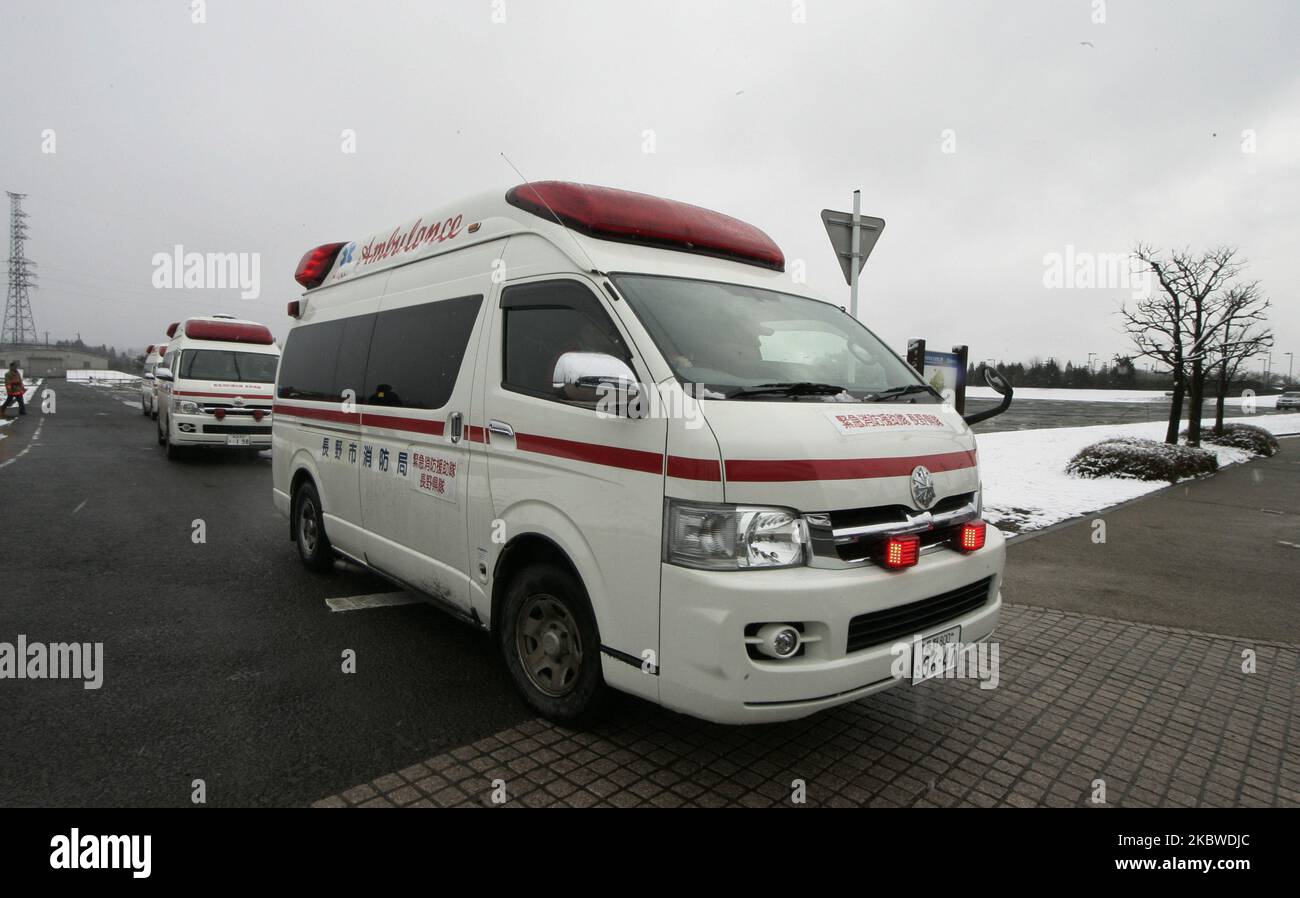 March 16, 2011-Sendai, Japan-Japanese ambulance go a head to pemporary ...