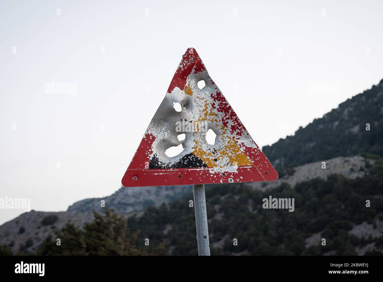 Shot road signs in Sfakia in Crete, Greece on July 30, 2020. In the ...