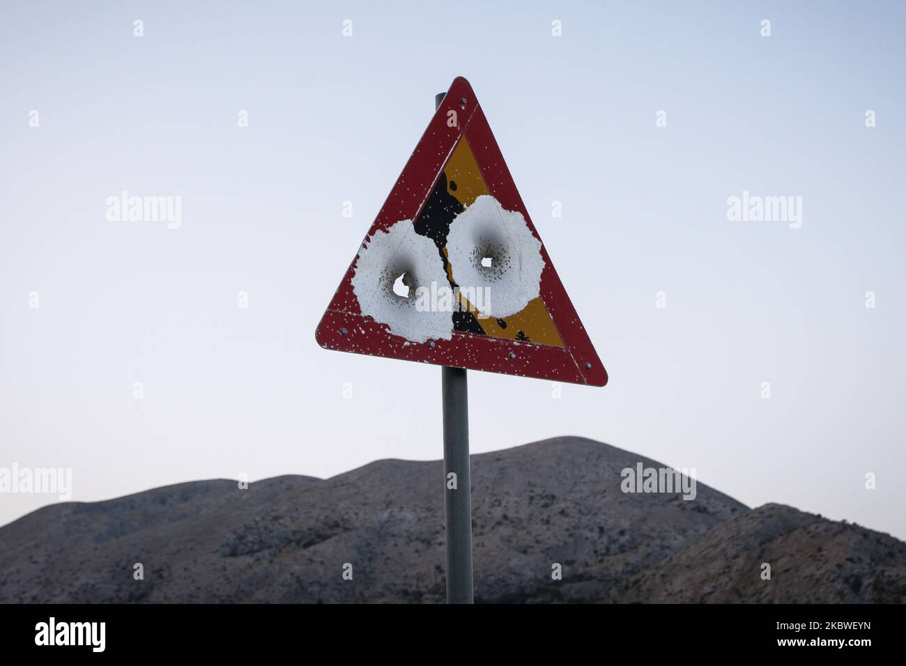 Shot road signs in Sfakia in Crete, Greece on July 30, 2020. In the ...
