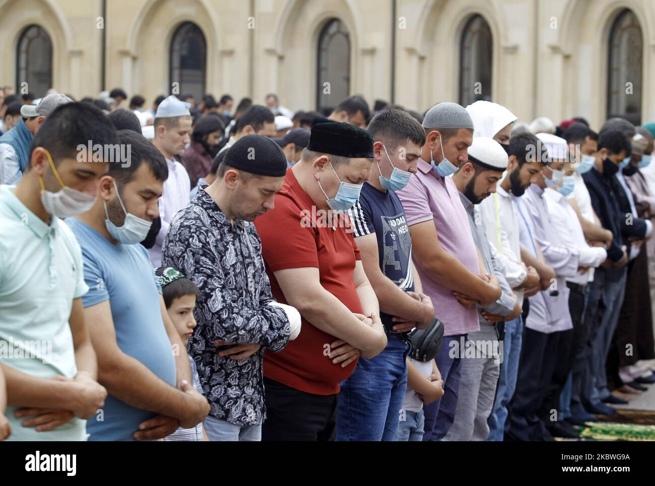 Muslims participate at the Eid al-Adha prayer at the Ar-Rahma mosque in ...