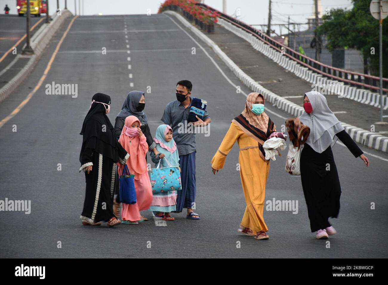 Muslims perform the Eid al-Adha 1441 Hijri prayer during the Pandemic ...