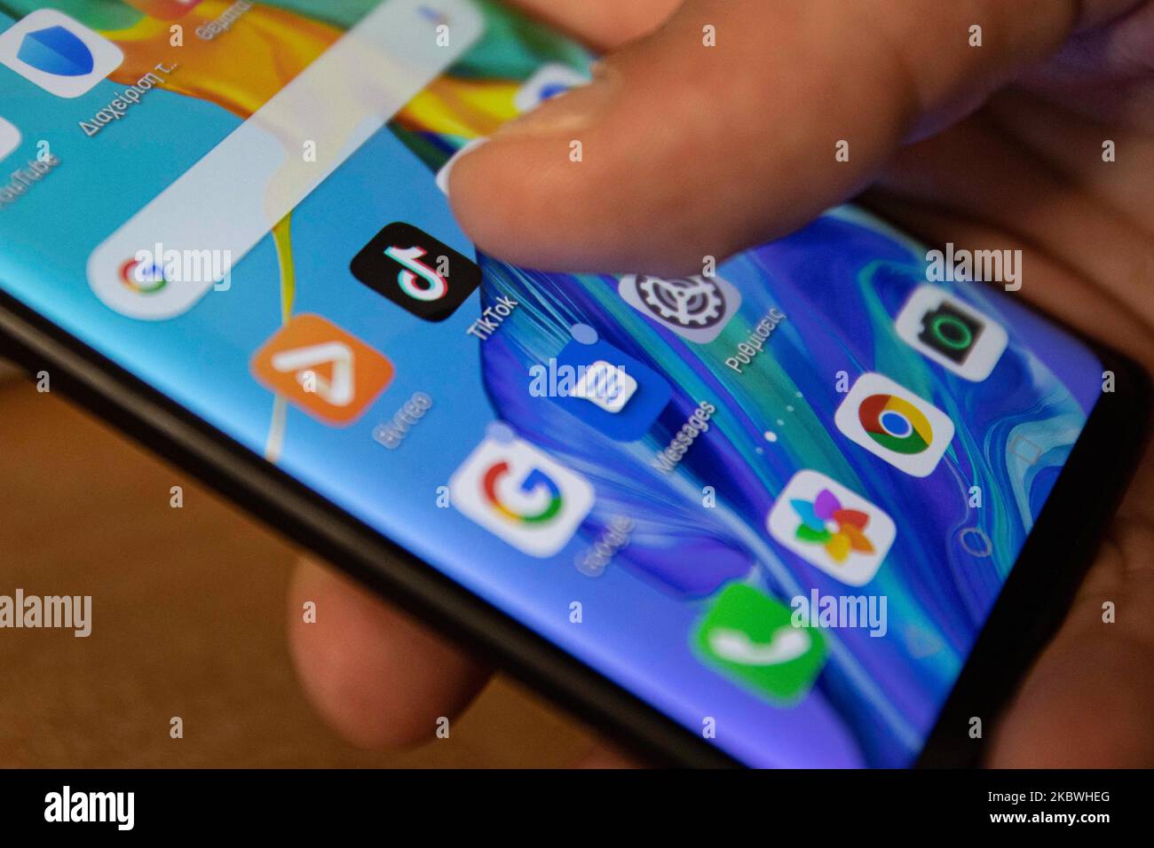 TikTok closeup logo displayed on a phone screen, smartphone and ...