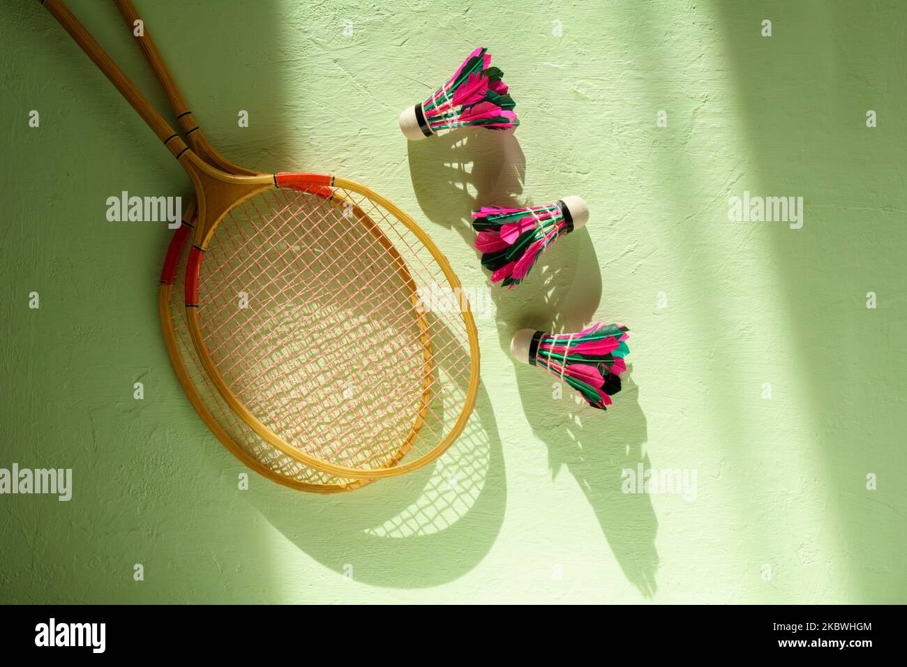 badminton rackets and shuttlecock on the green table. Flat lay Stock ...