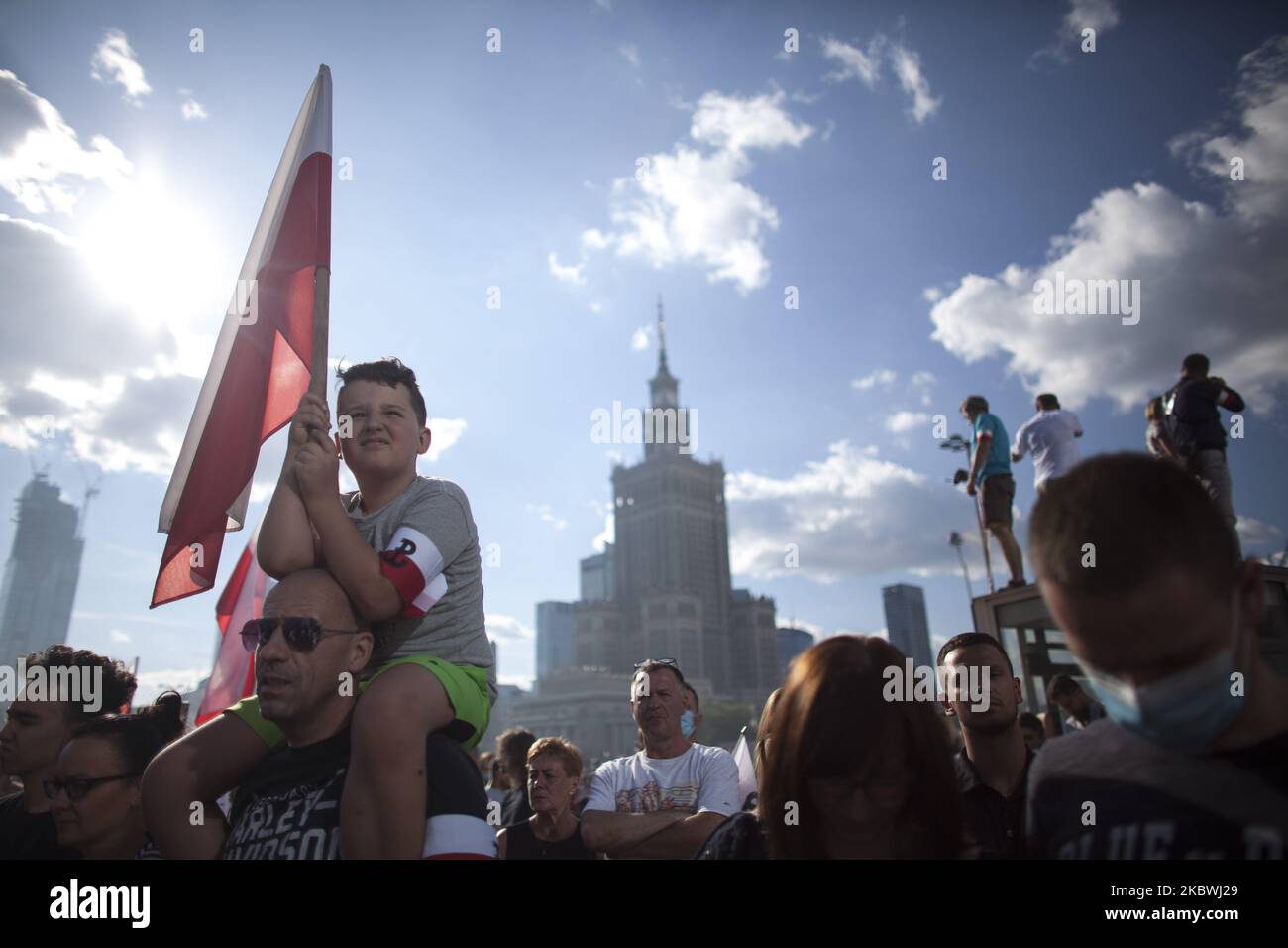 A child holds polish flag during celebration of 76 anniversary of ...