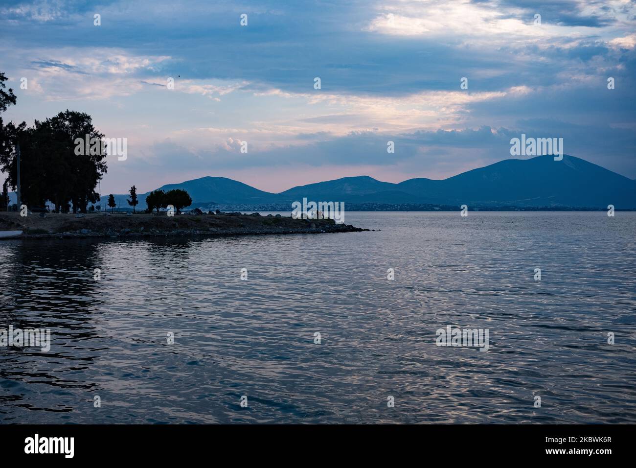 Clouds in the sky over the island Euboea in Nea Artaki, Greece on ...