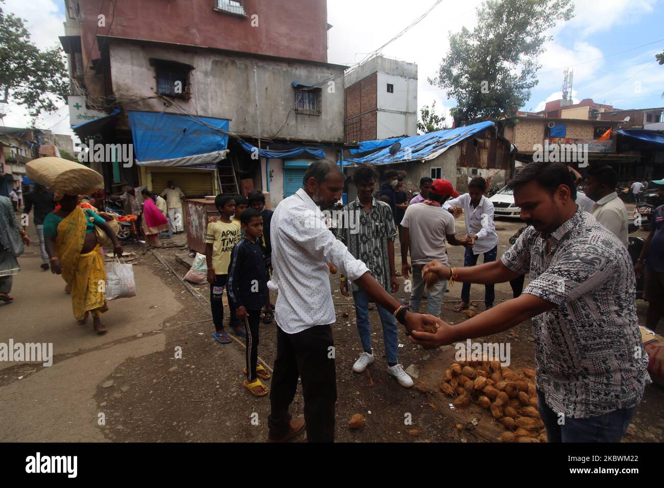 Breaking coconut on ground hi-res stock photography and images - Alamy