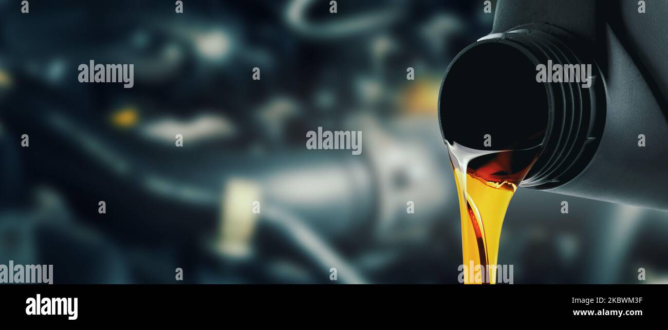 change and pour new car engine oil into the motor. banner with copy ...